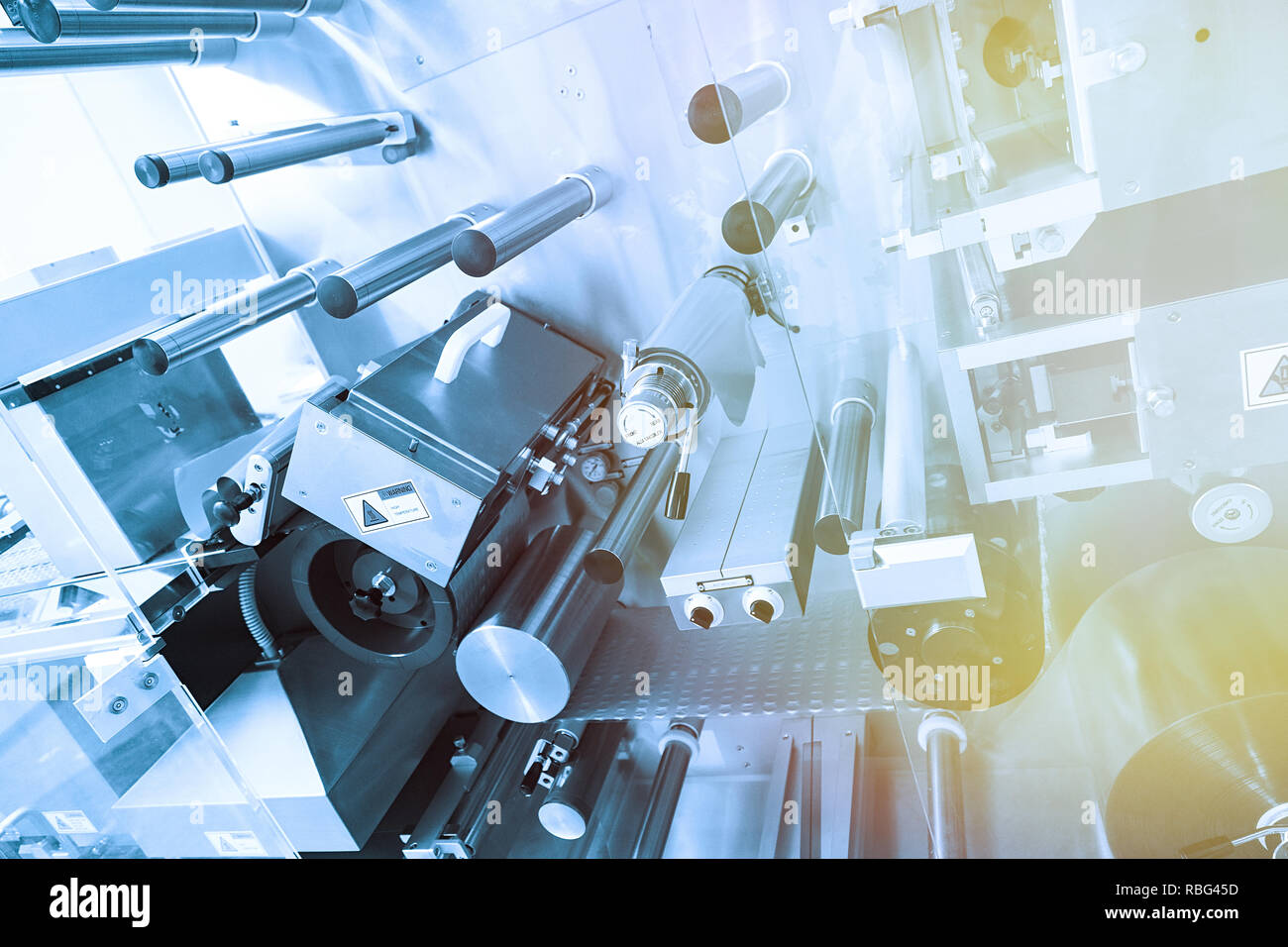 steel chrome machines with shafts. Blue tone. Blue tint Stock Photo - Alamy