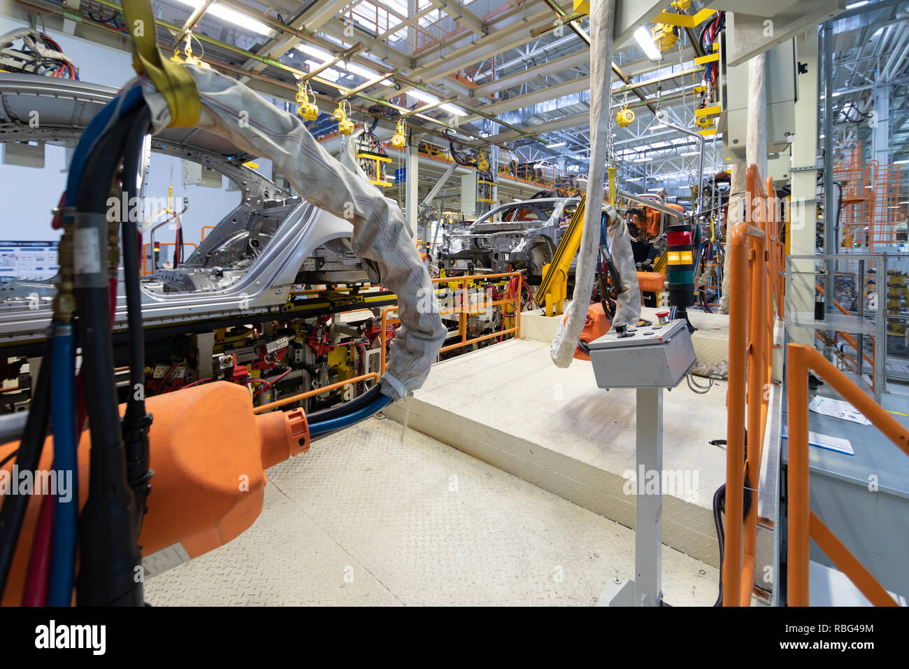 body of car on conveyor Modern Assembly of cars at plant. automated ...