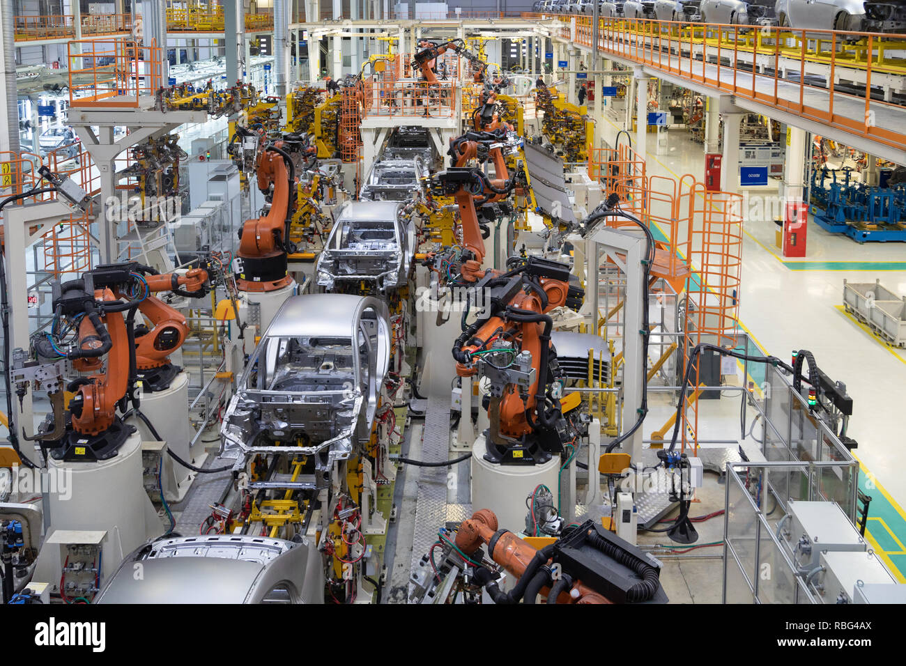 body of car on conveyor top view. Modern Assembly of cars at the plant ...