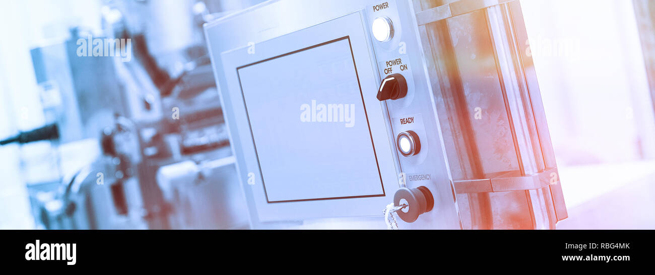 big steel machine with shafts and control panel Stock Photo - Alamy