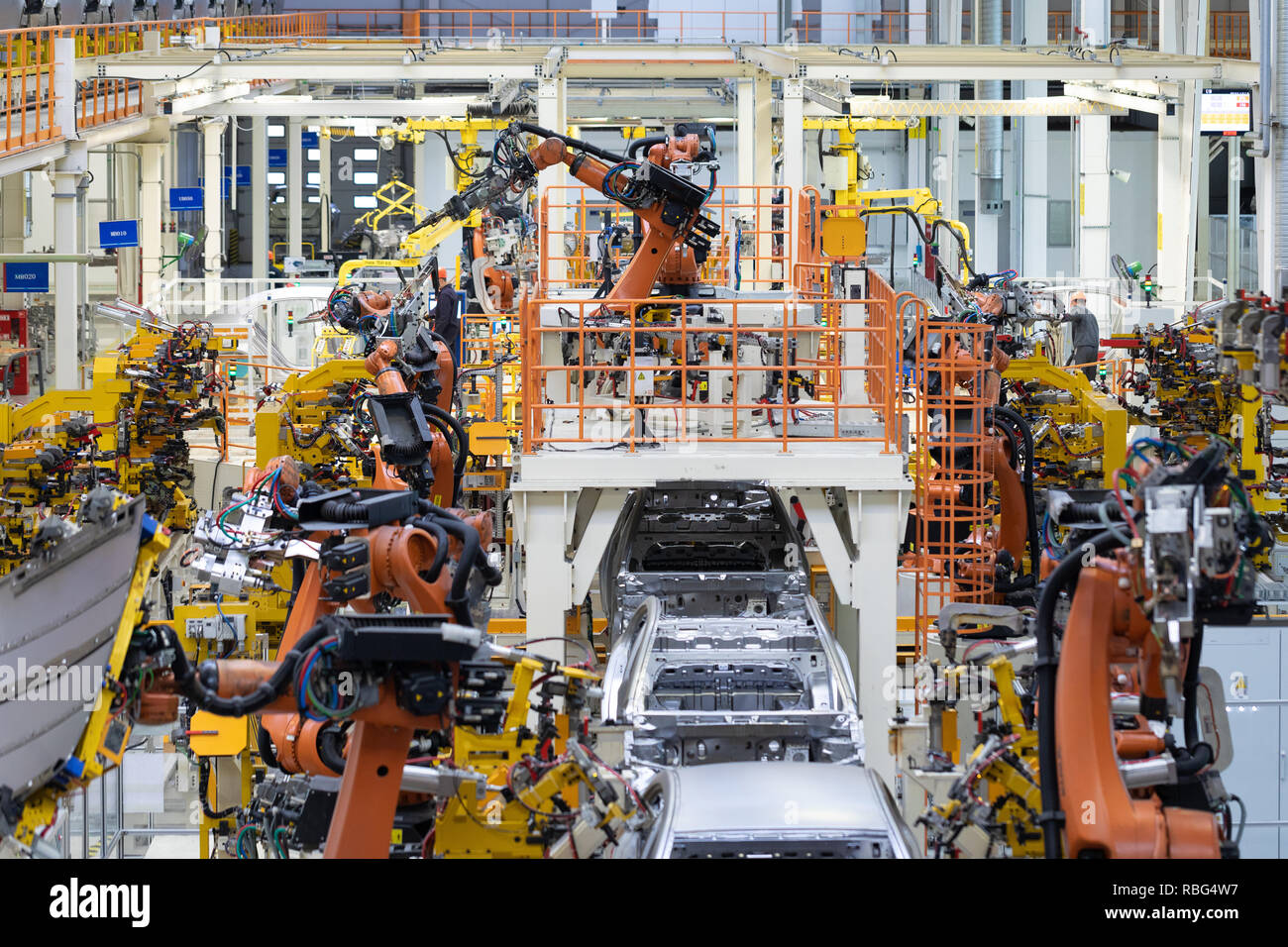 body of car on conveyor Modern Assembly of cars at plant. automated ...
