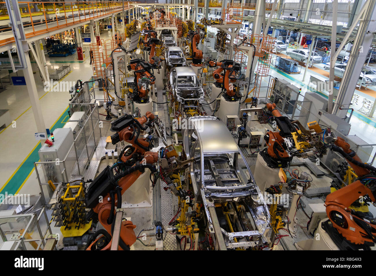 body of car on conveyor top view. Modern Assembly of cars at the plant ...
