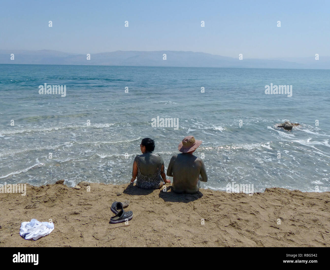 Israel, Dead Sea, tourists cover themselves in therapeutic mud in order ...