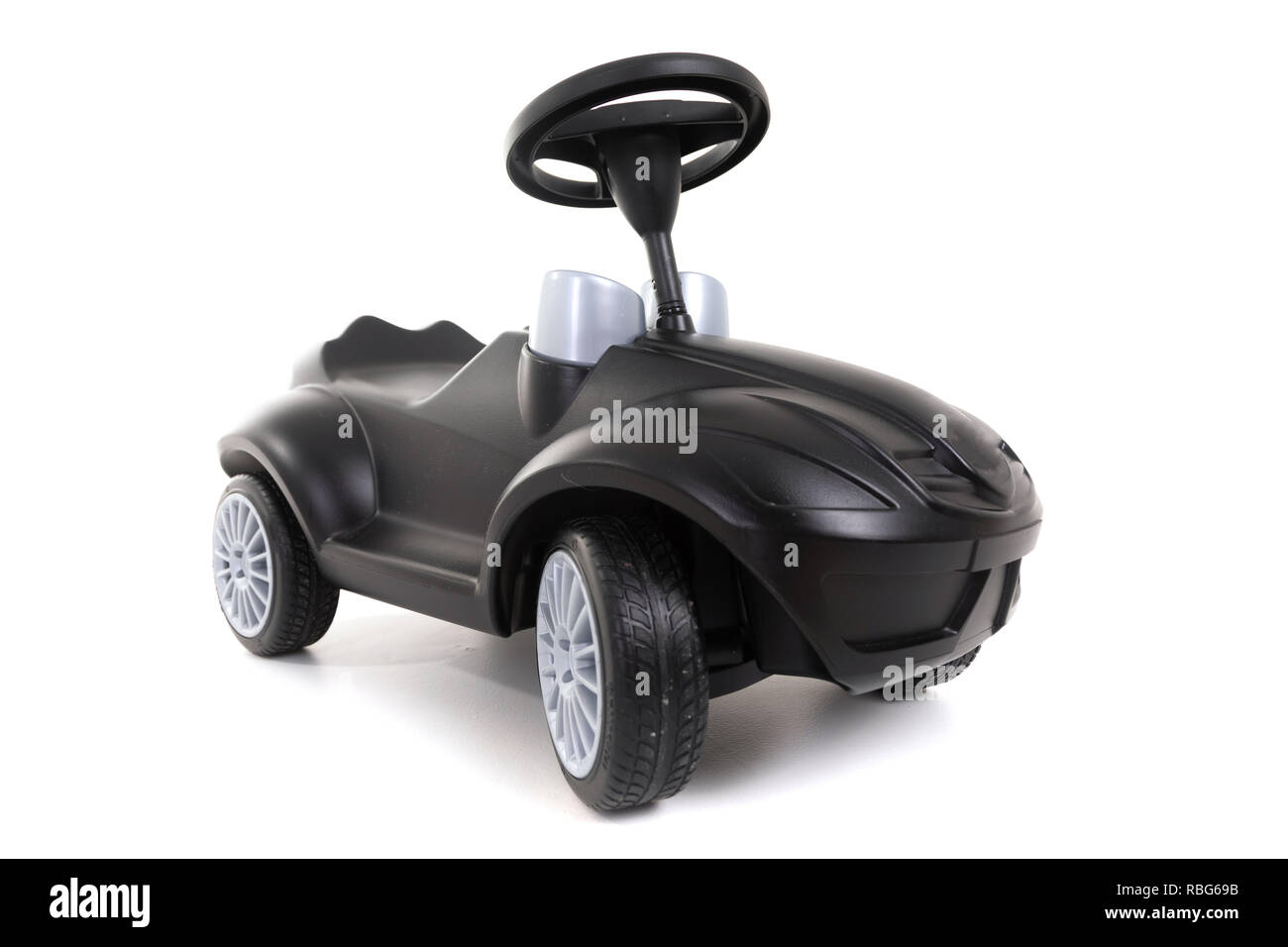 Black toy car isolated on white background Stock Photo - Alamy
