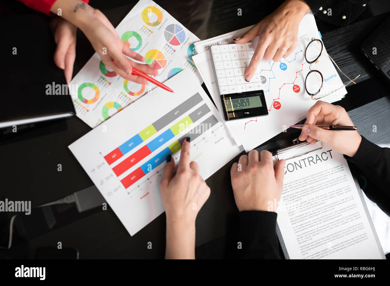 Office Desk with documents and calculator top view Stock Photo - Alamy