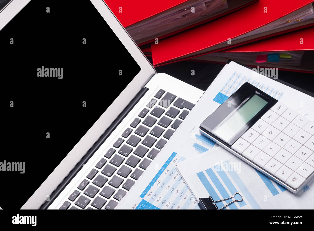 Office workplace with documents and stationery near red folders Stock ...