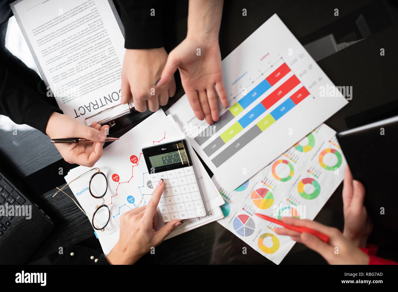 Office Desk with documents and calculator top view Stock Photo - Alamy