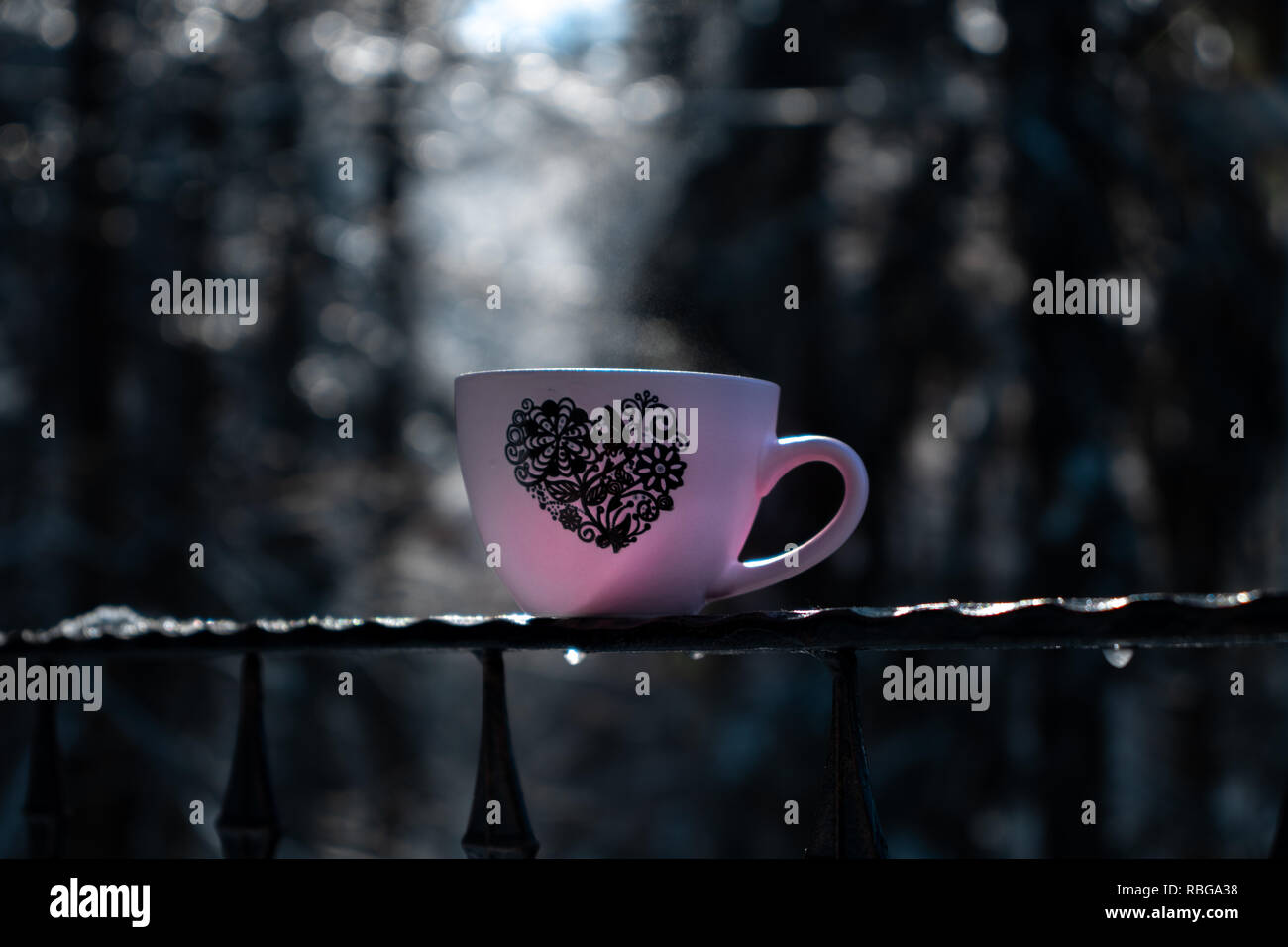 Cup Of Coffee, forest in the background Stock Photo - Alamy