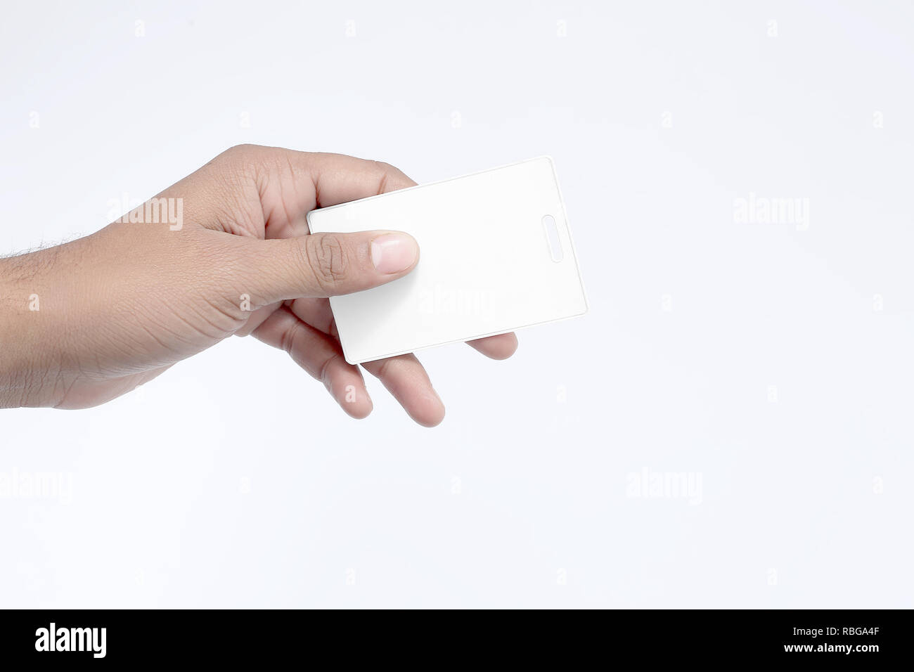 Picture of man hand is holding blank tag card. Isolated on the white ...