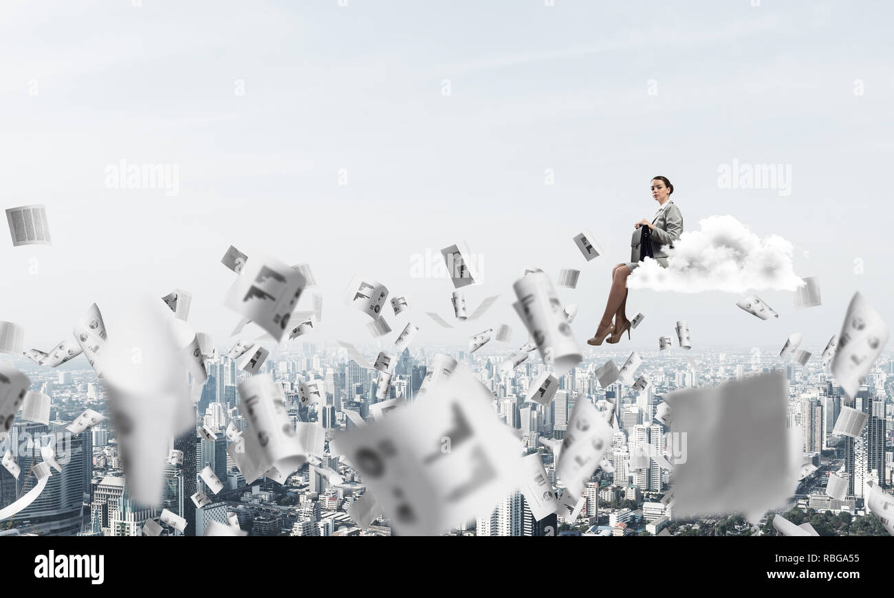Woman float above city on cloud and papers flying around Stock Photo ...