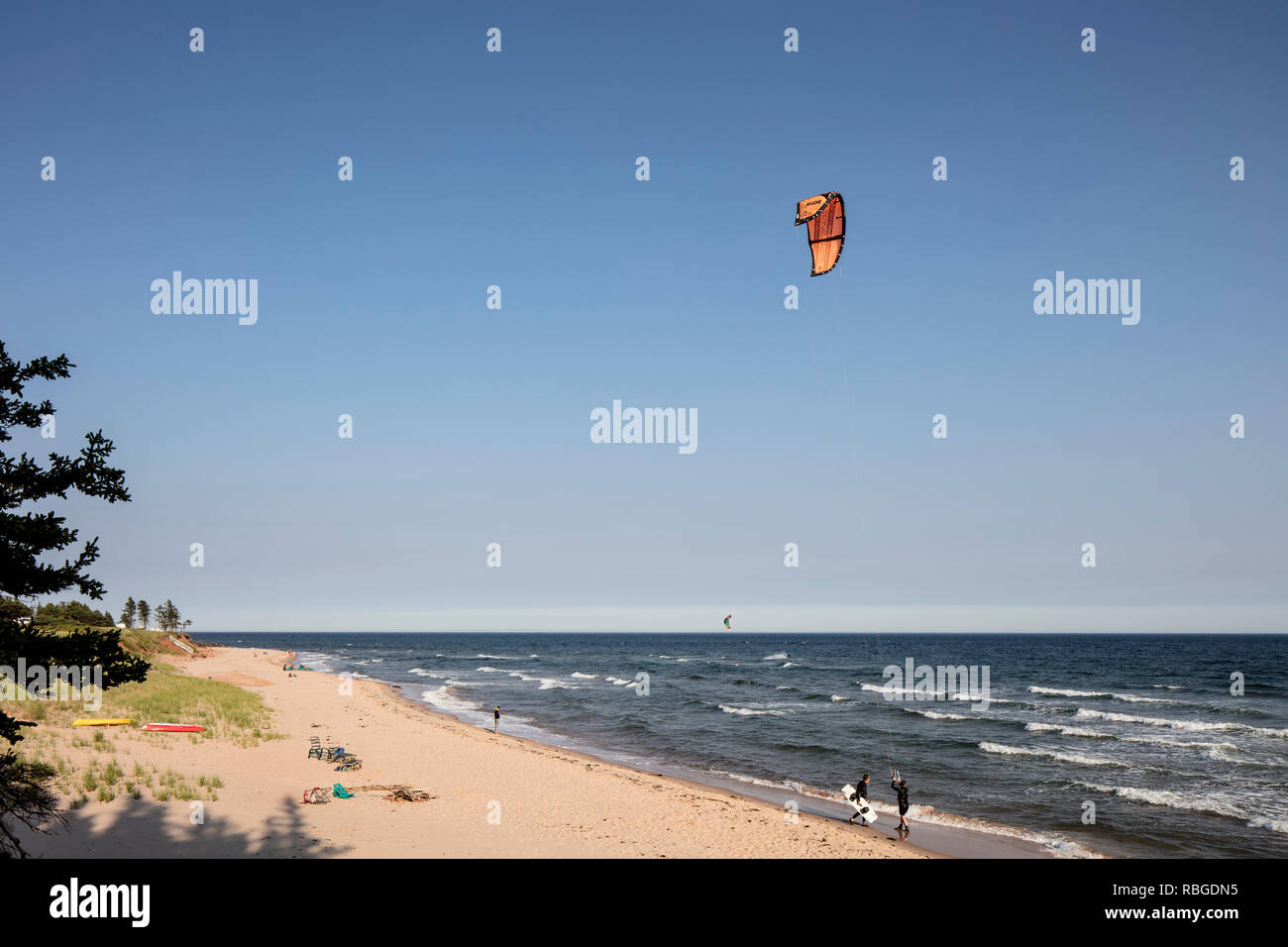 RED POINT, PRINCE EDWARD ISLAND, CANADA - July 9, 2018: Kite boarders ...