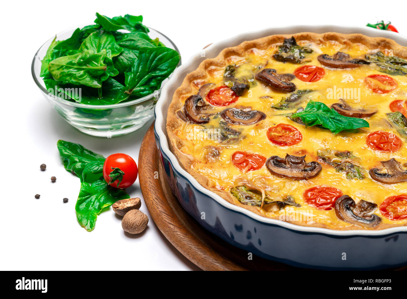 Baked homemade quiche pie in ceramic baking form Stock Photo - Alamy