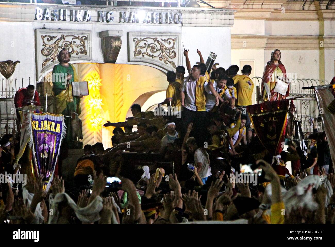 Philippines. 09th Jan, 2019. Devotees wave their hands to give respect ...