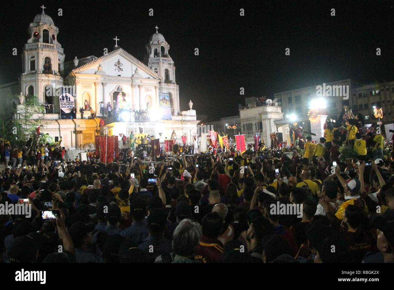 Philippines. 09th Jan, 2019. Devotees wave their hands to give respect ...