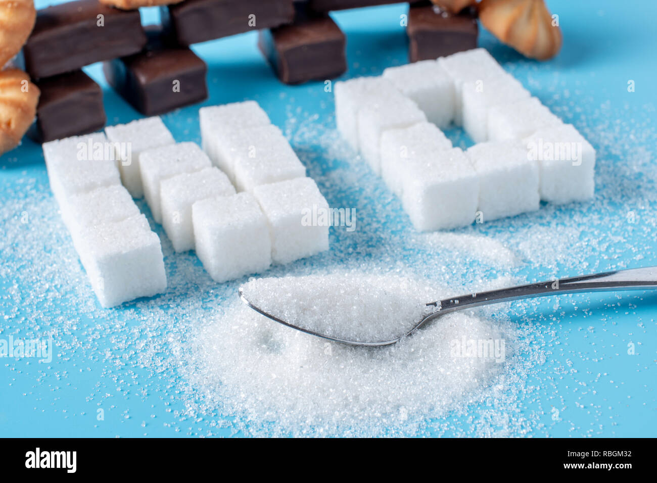 Text No is lined with sugar cubes with sweets and cookies. The concept ...