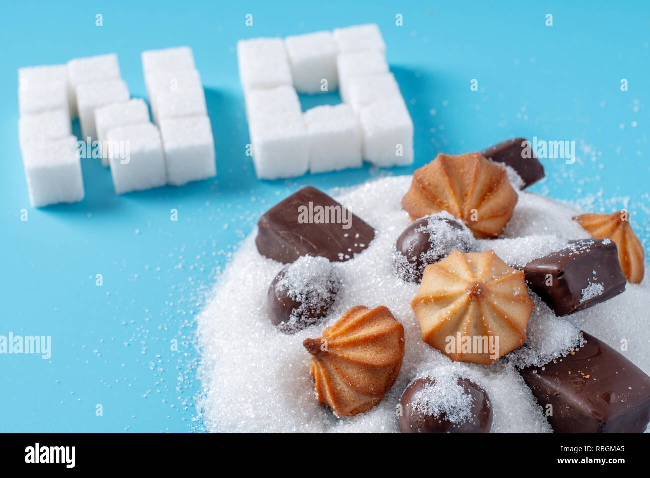 Text No is lined with sugar cubes with sweets candy. The concept of ...