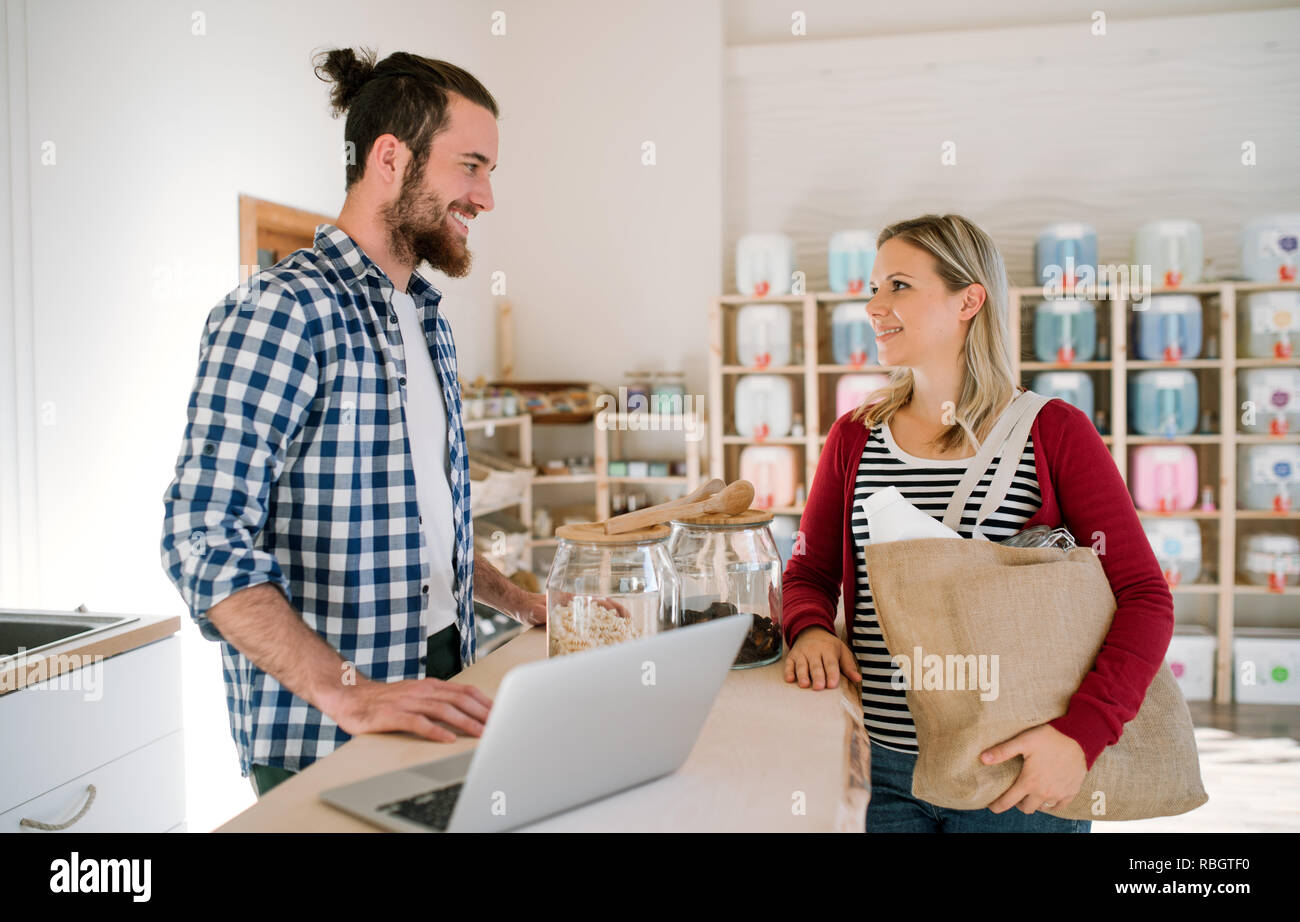 Attractive shop assistant hi-res stock photography and images - Alamy