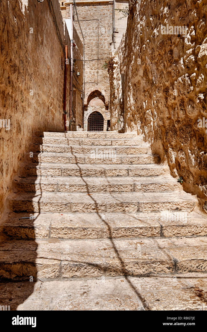 Steps lead toward the back entrance of a building in the Arab Quarter ...