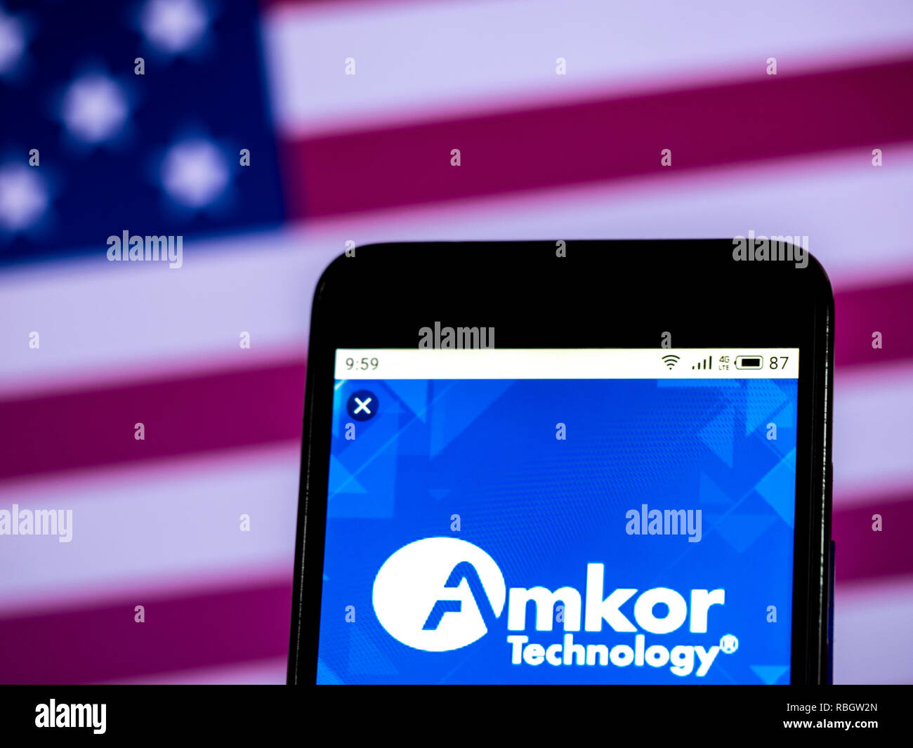 Amkor Technology Semiconductor manufacturing company logo seen ...
