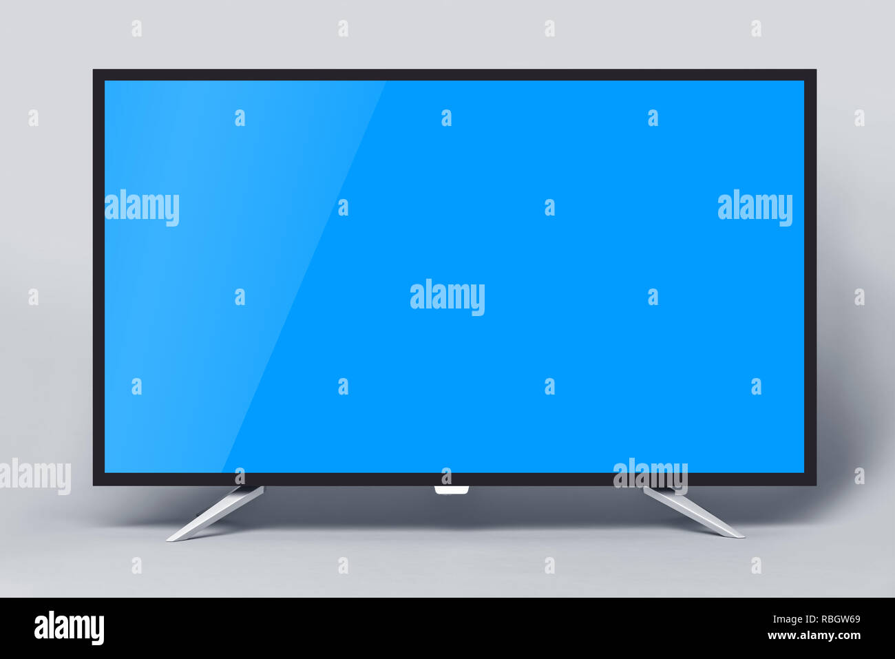 Modern TV or PC monitor on gray background Stock Photo - Alamy