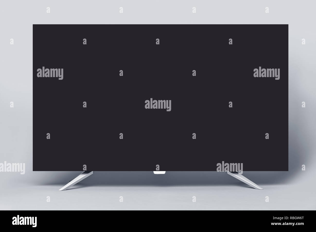 Modern TV or PC monitor on gray background Stock Photo - Alamy