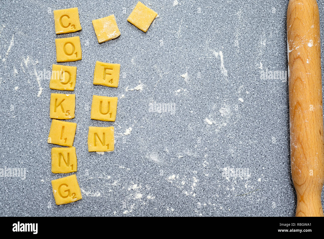 Cooking fun - scrabble words made from biscuit / cookie dough Stock ...