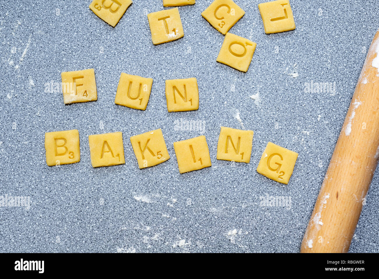 Fun baking - scrabble words made from biscuit / cookie dough Stock ...