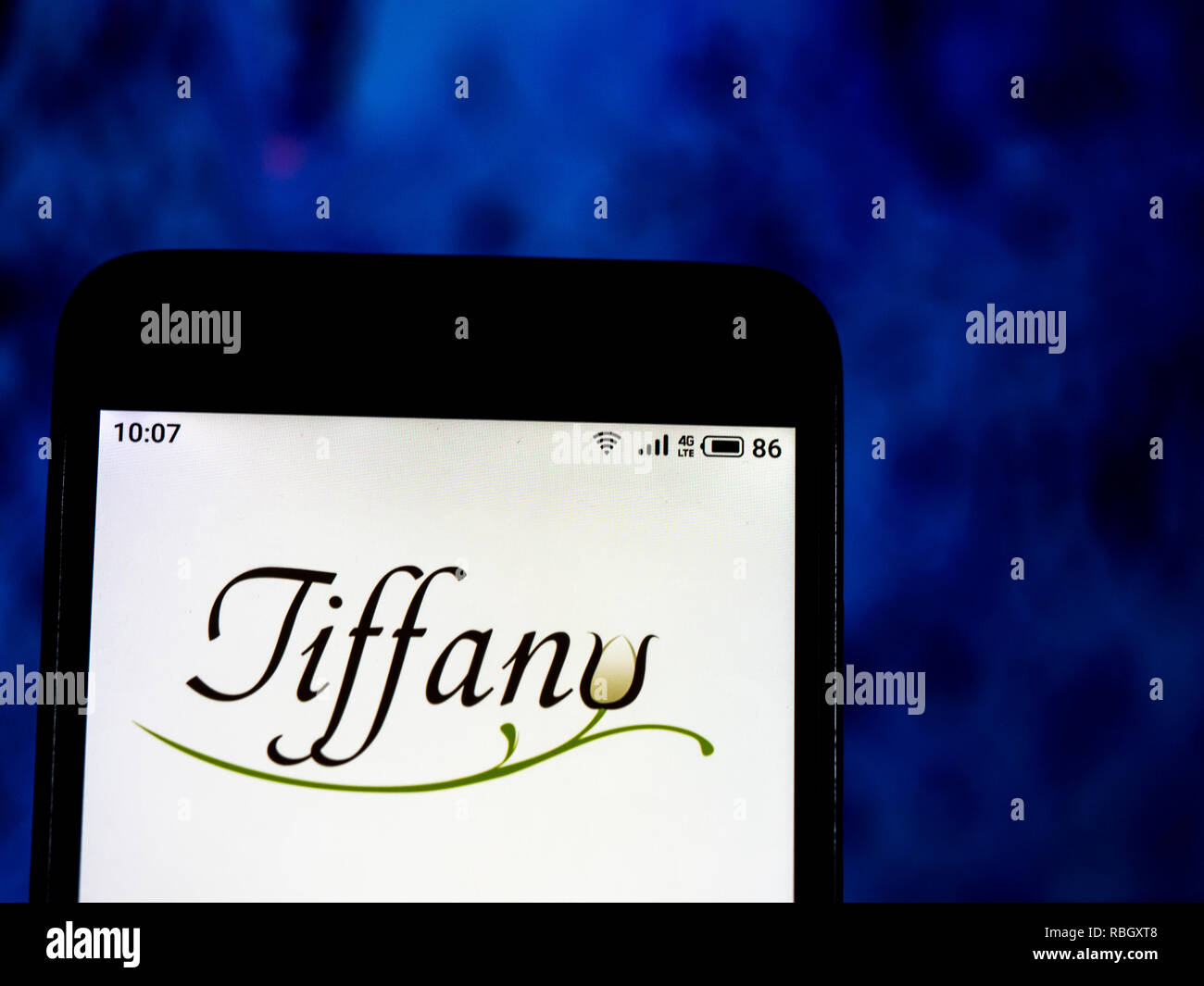 Tiffany & Co. Jewelry company logo seen displayed on smart phone Stock ...