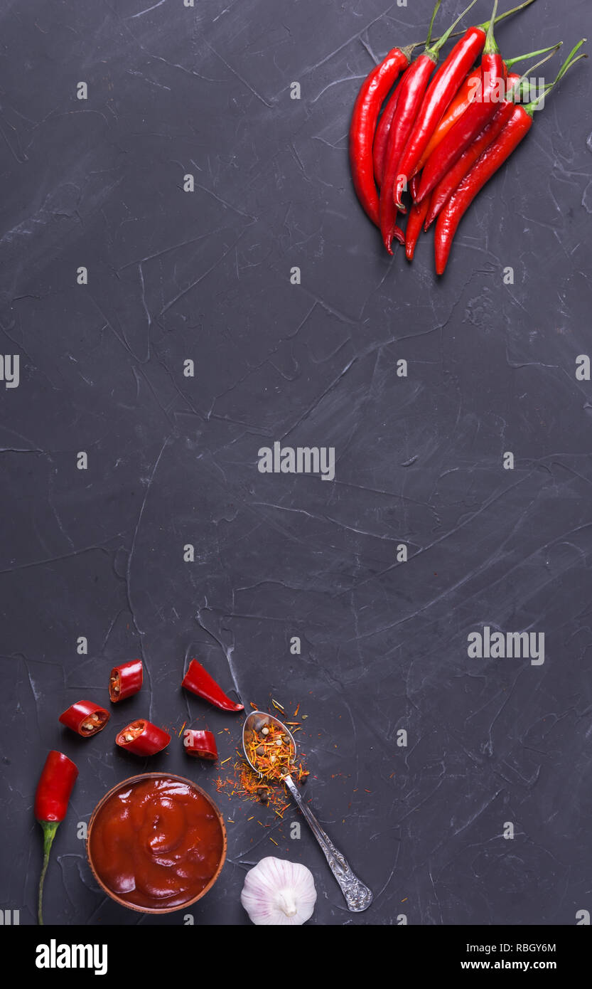 Red spicy chili pepper on dark background Stock Photo - Alamy