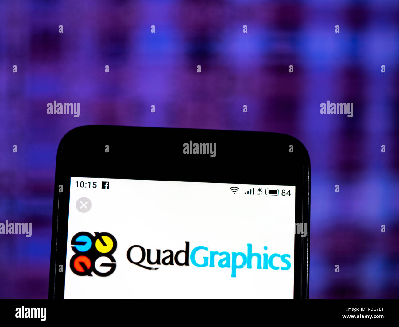 Quad/Graphics Company logo seen displayed on smart phone Stock Photo ...