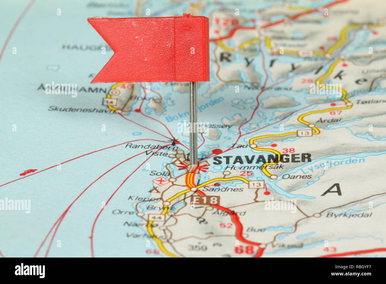 Stavanger - large city in Norway. Red flag pin on an old map showing ...