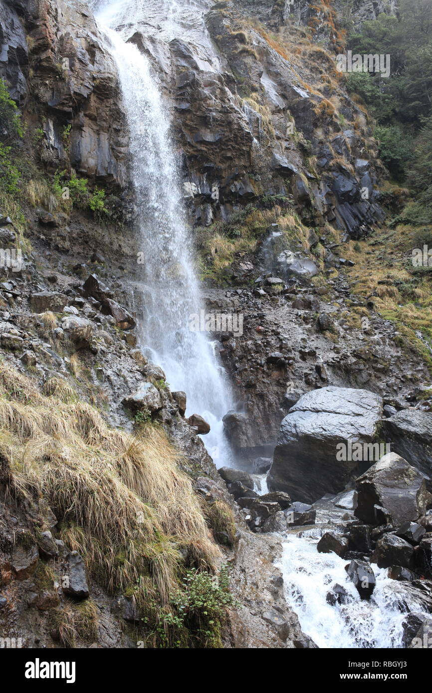 Mountain valley waterfall Stock Photo - Alamy