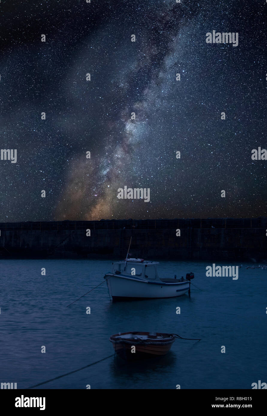 Stunning vibrant Milky Way composite image over landscape of Fishing ...