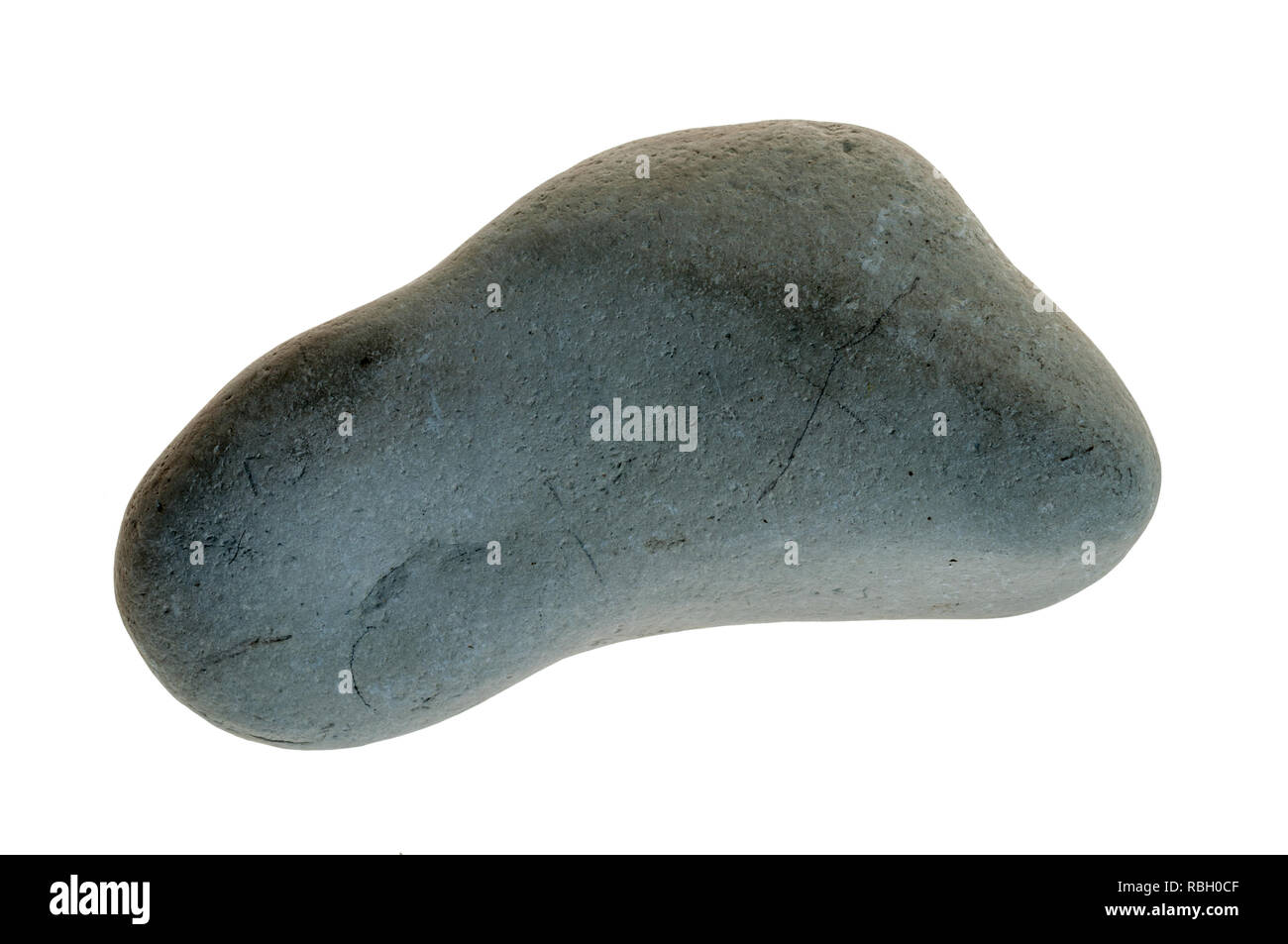 Single grey pebble isolated on white Stock Photo - Alamy