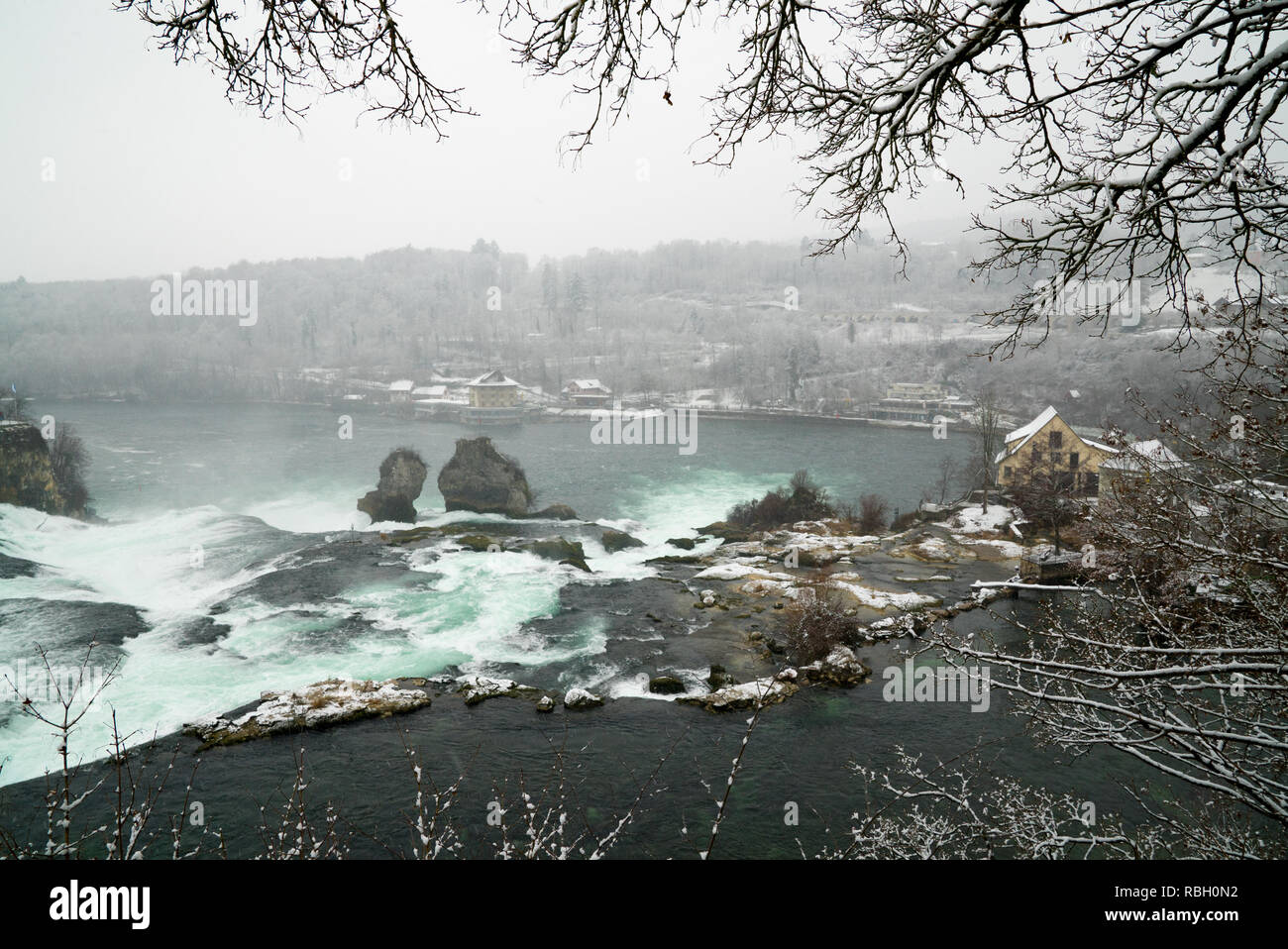 landscape view of the Rhine Falls waterfall in Switzerland on a winter ...