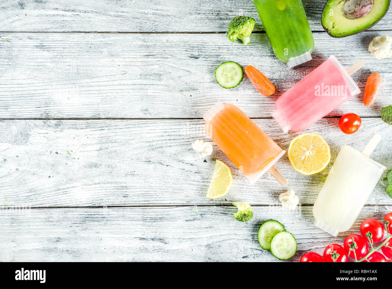 Trendy vegan food, vegetable ice cream popsicles, avocado, cucumber ...