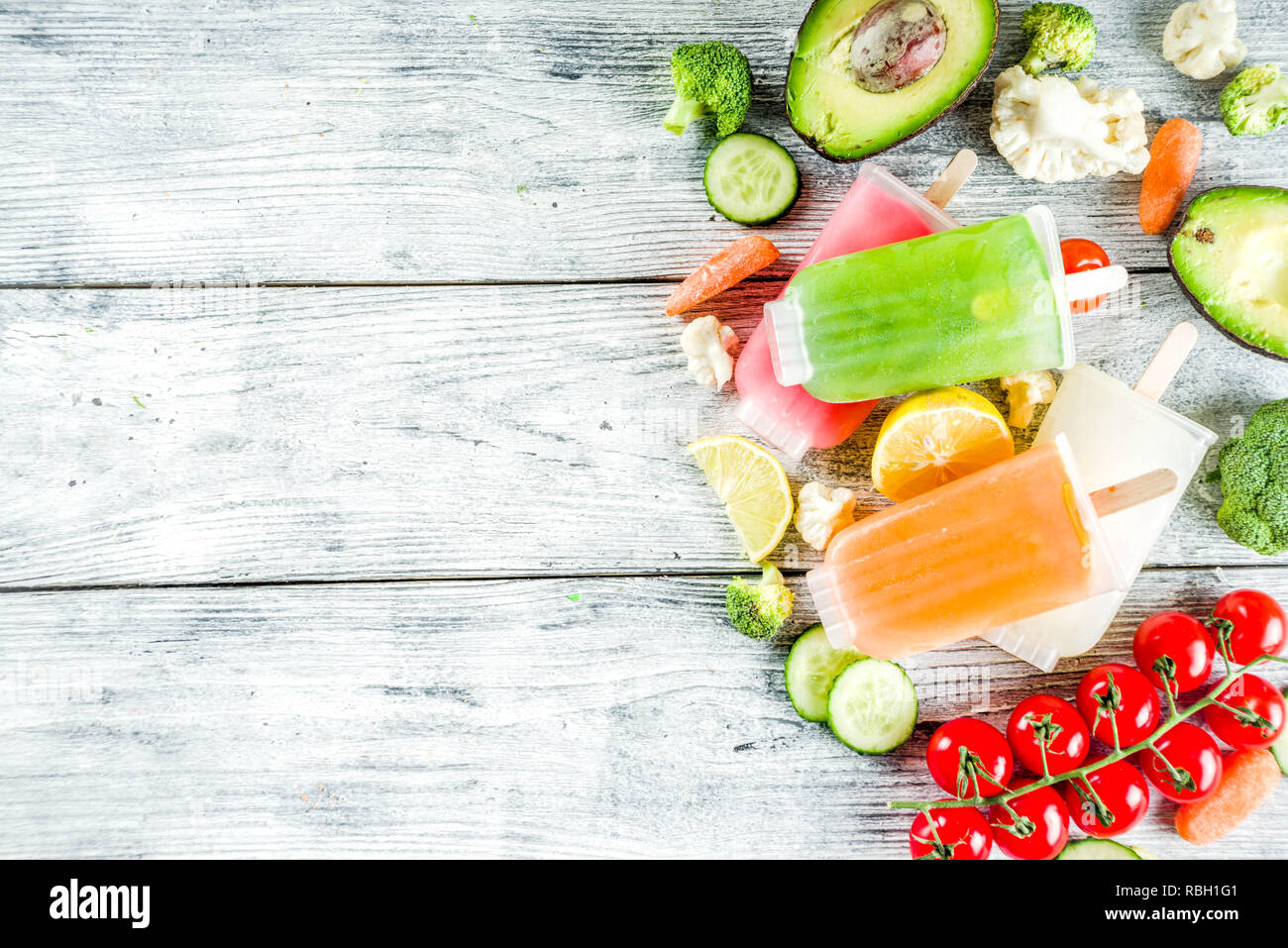 Trendy vegan food, vegetable ice cream popsicles, avocado, cucumber ...