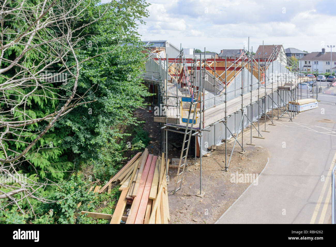 Wood paneling being installed at Maggies Life Centre, Velindre Hospital ...