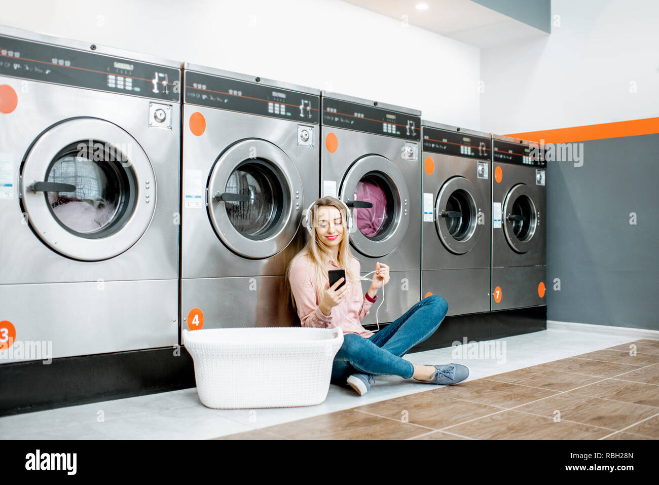 Girl Sitting On Washing Machine High Resolution Stock Photography and ...