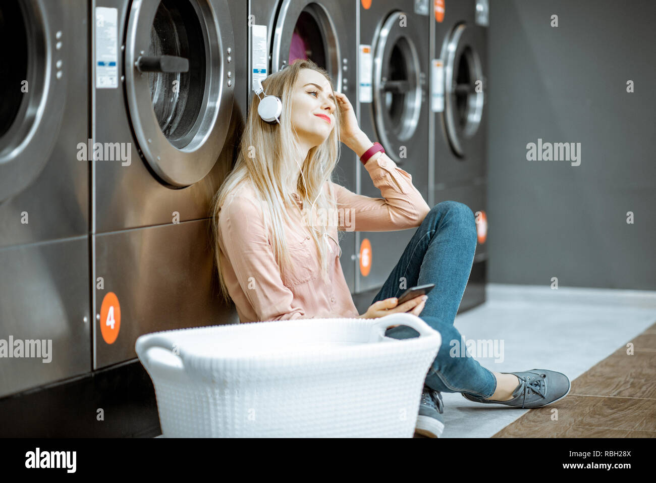Girl Sitting On Washing Machine High Resolution Stock Photography and ...