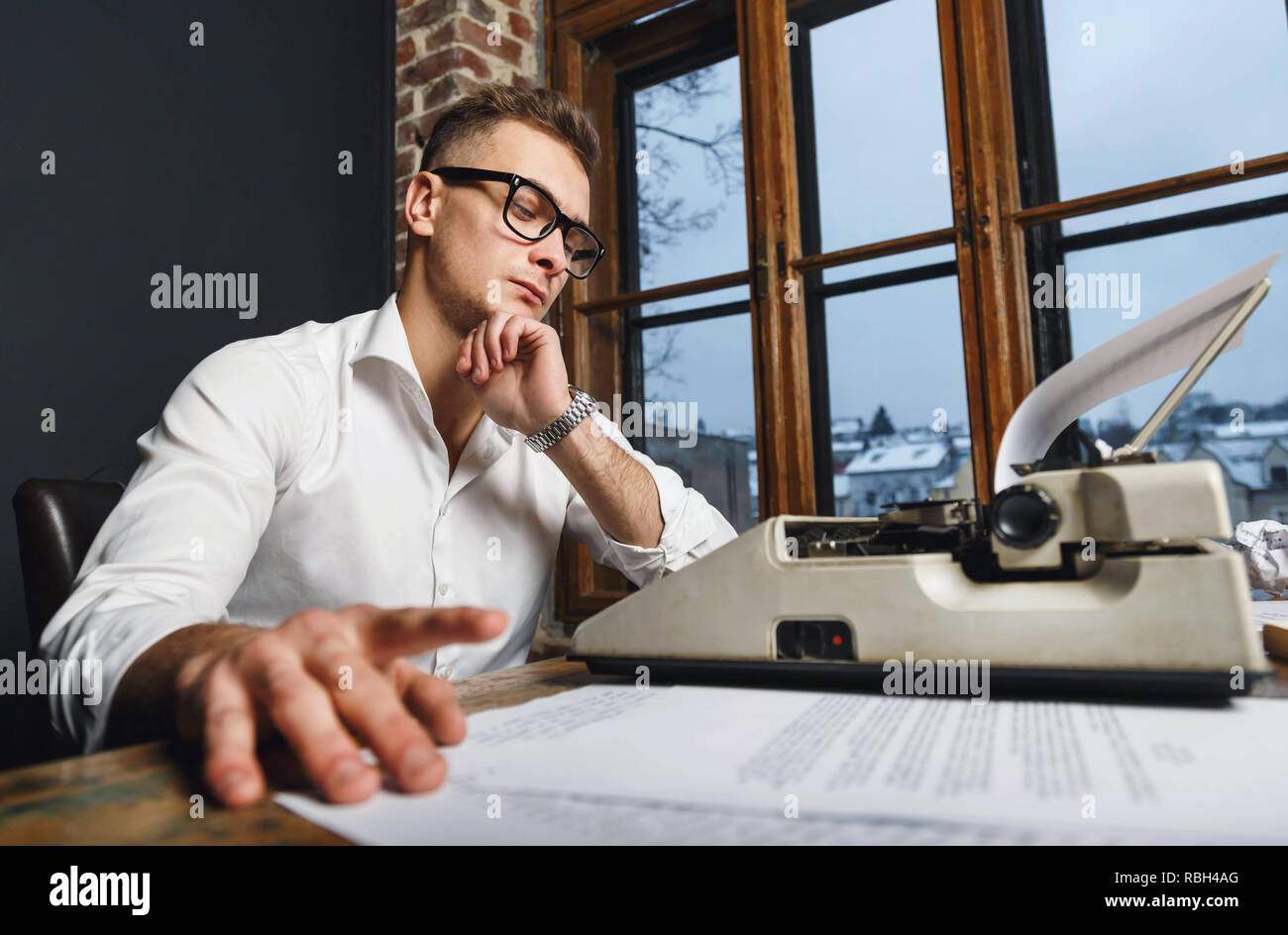 Man writing in vintage typewriter hi-res stock photography and images ...