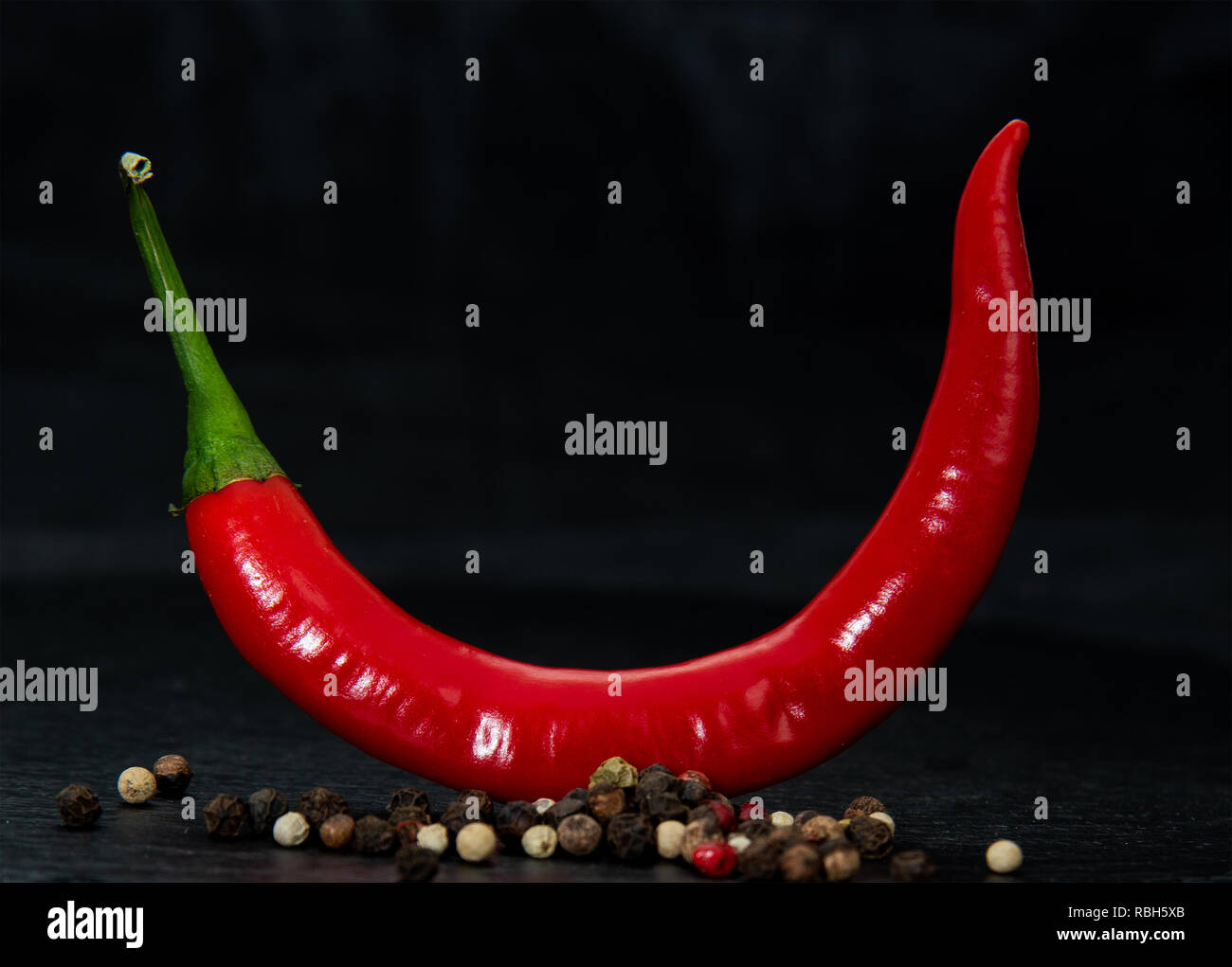 Curled red hot chili pepper hi-res stock photography and images - Alamy