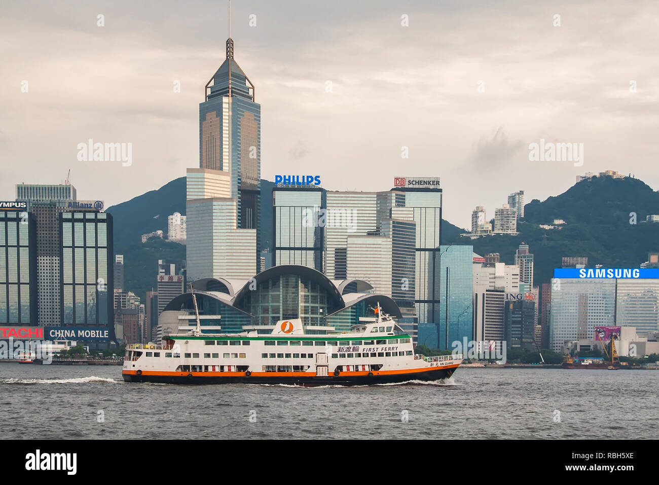 Ferry crossing Victoria Harbor from Tsim Sha Tsui with downtown Hong Kong's financial district ...