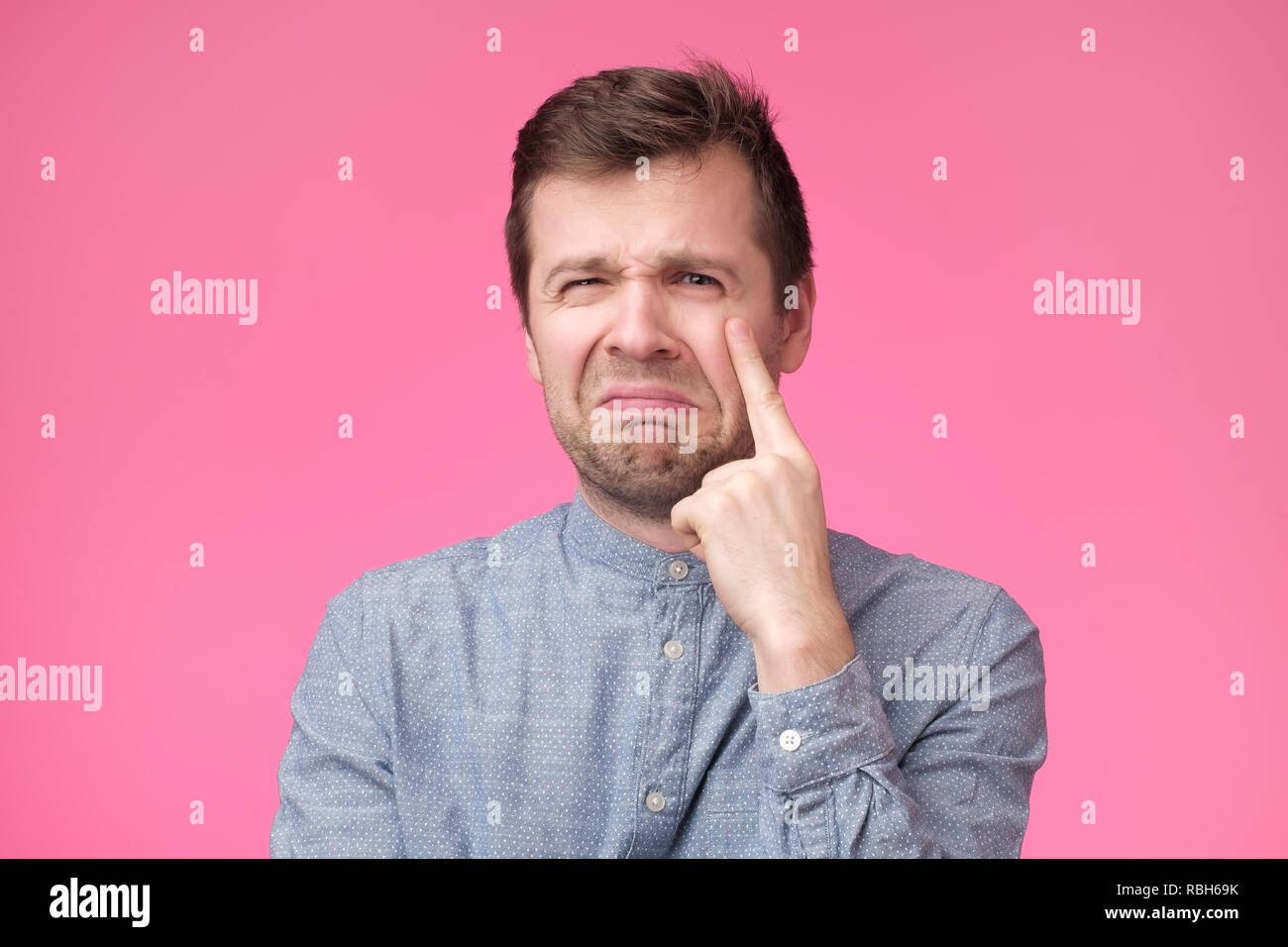 Young man crying tears hi-res stock photography and images - Alamy
