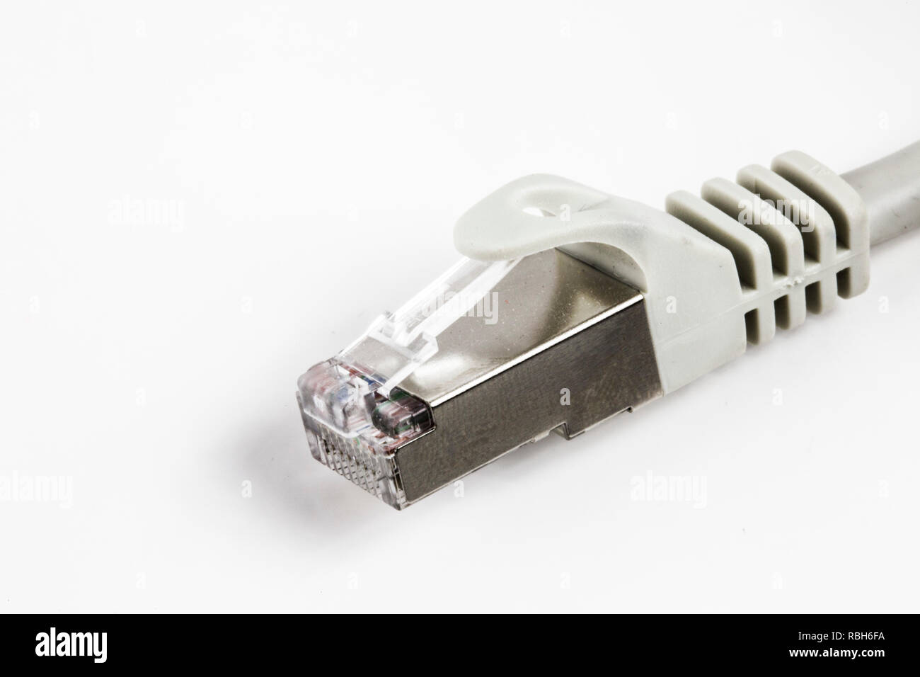 An internet cable isolated on a white background Stock Photo - Alamy