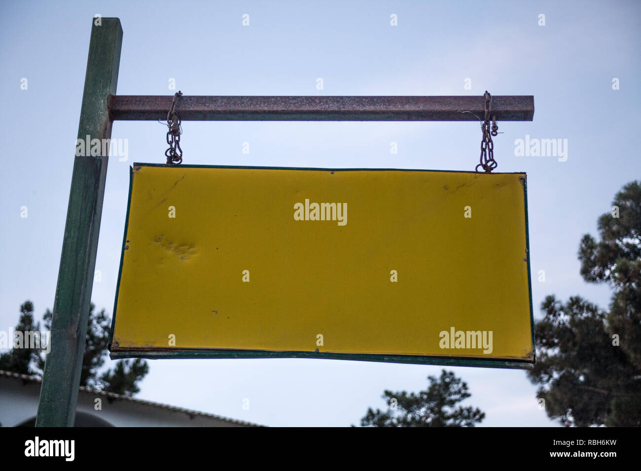 Sign hanging from metal chain hi-res stock photography and images - Alamy