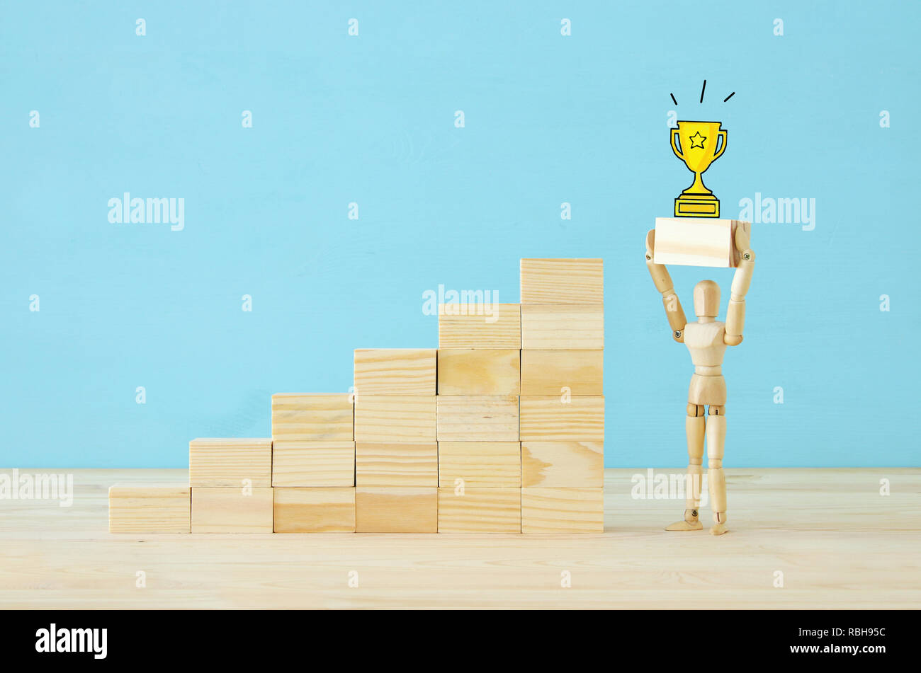 concept photo of obstacles overcoming, wooden dummy looking at a ...