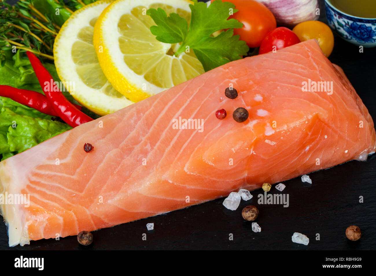 Salted salmon fillet with spices Stock Photo - Alamy