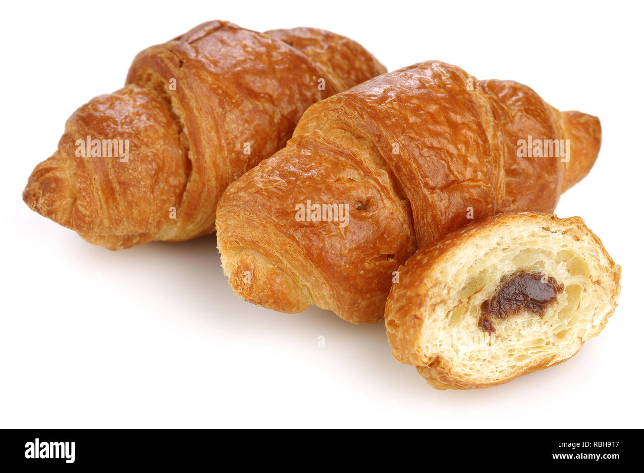 Sliced croissant with chocolate isolated on white background Stock ...