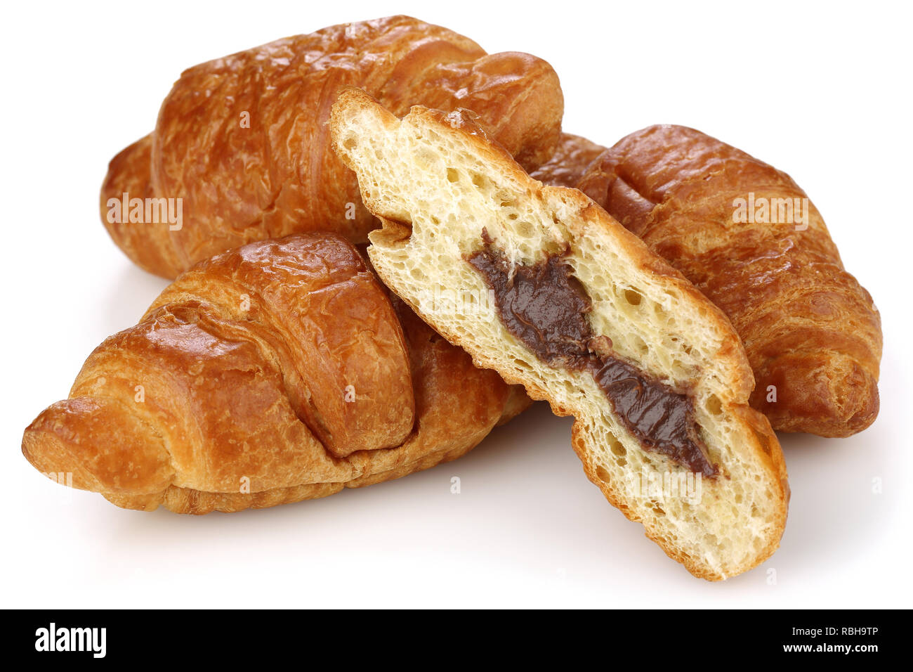 Sliced croissant with chocolate isolated on white background Stock ...